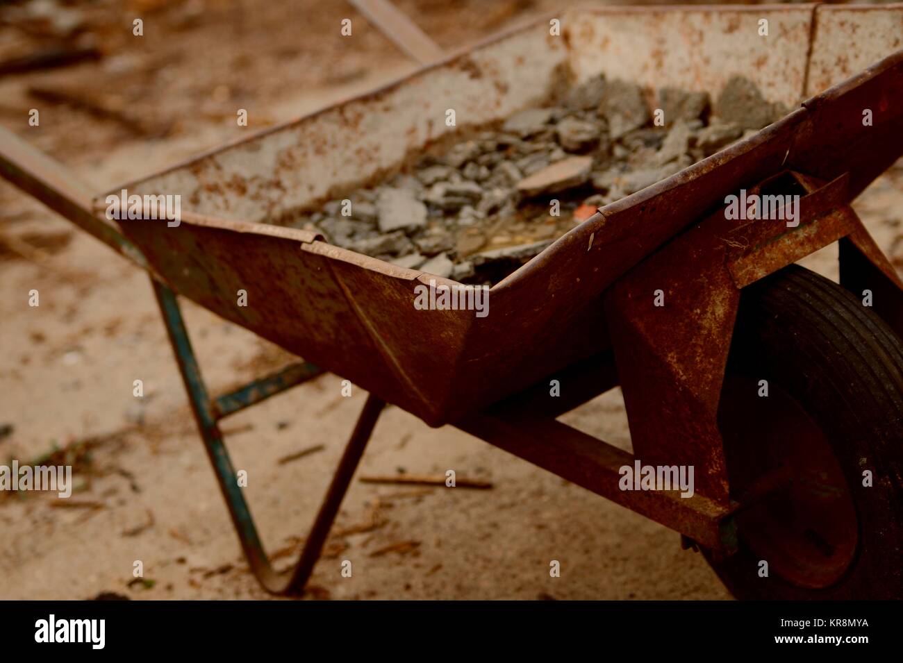 Wheelbarrow rubble hi-res stock photography and images - Alamy