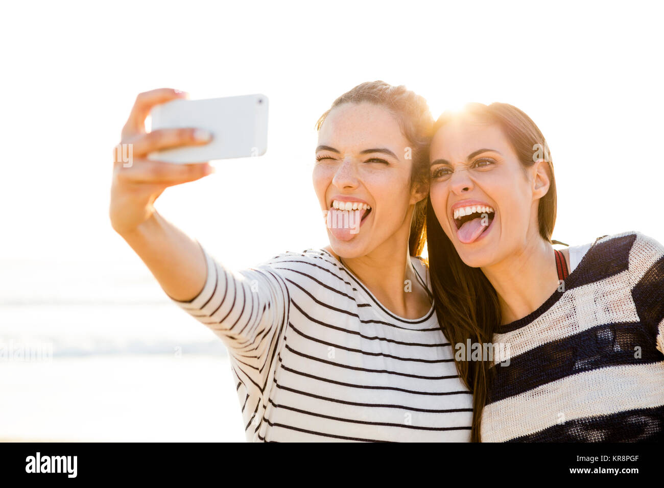 Best friends taking a selfie Stock Photo - Alamy
