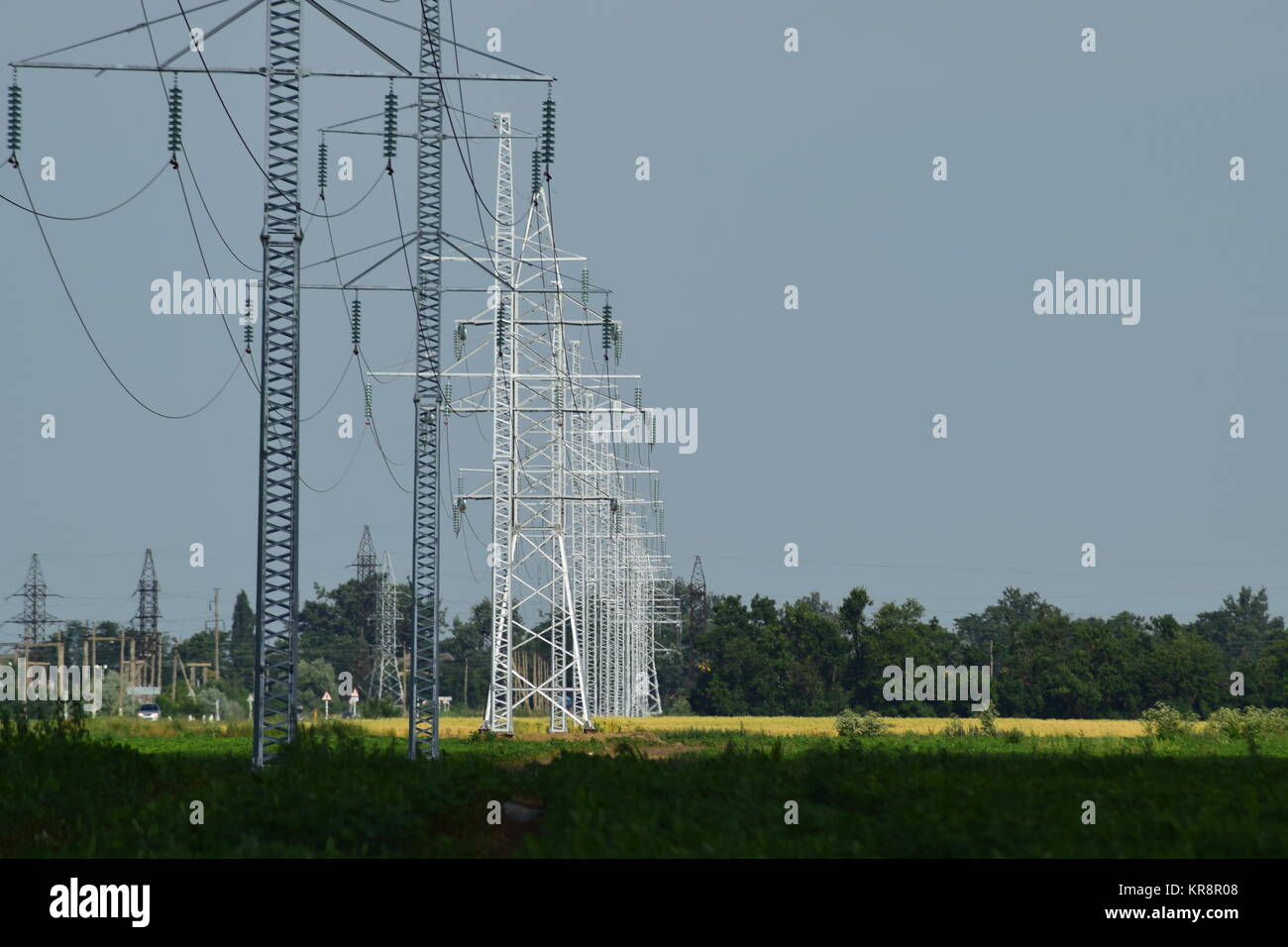 Assembly and installation of new support a power line Stock Photo - Alamy