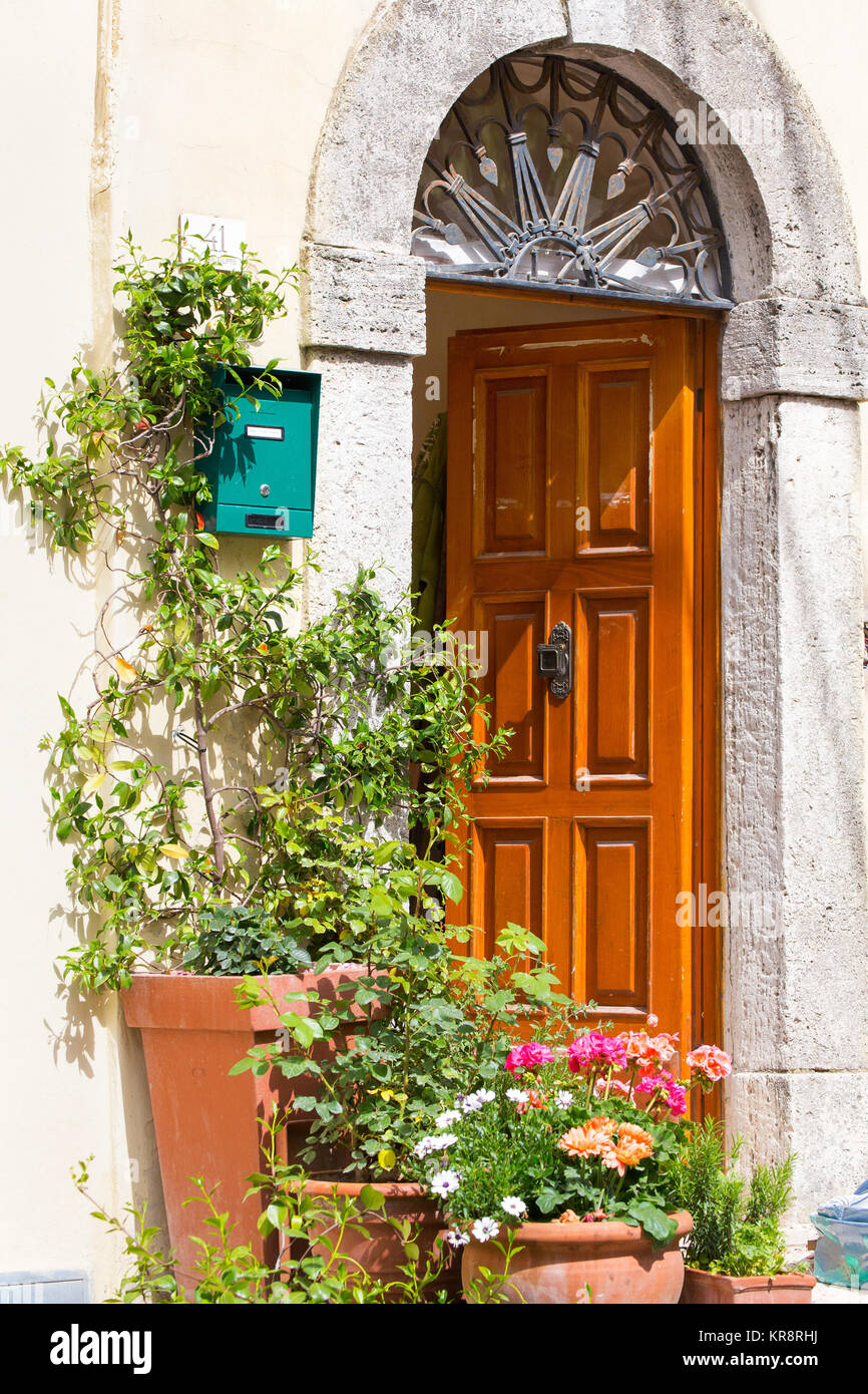 Italian house exterior decorated with potted plants Stock Photo - Alamy