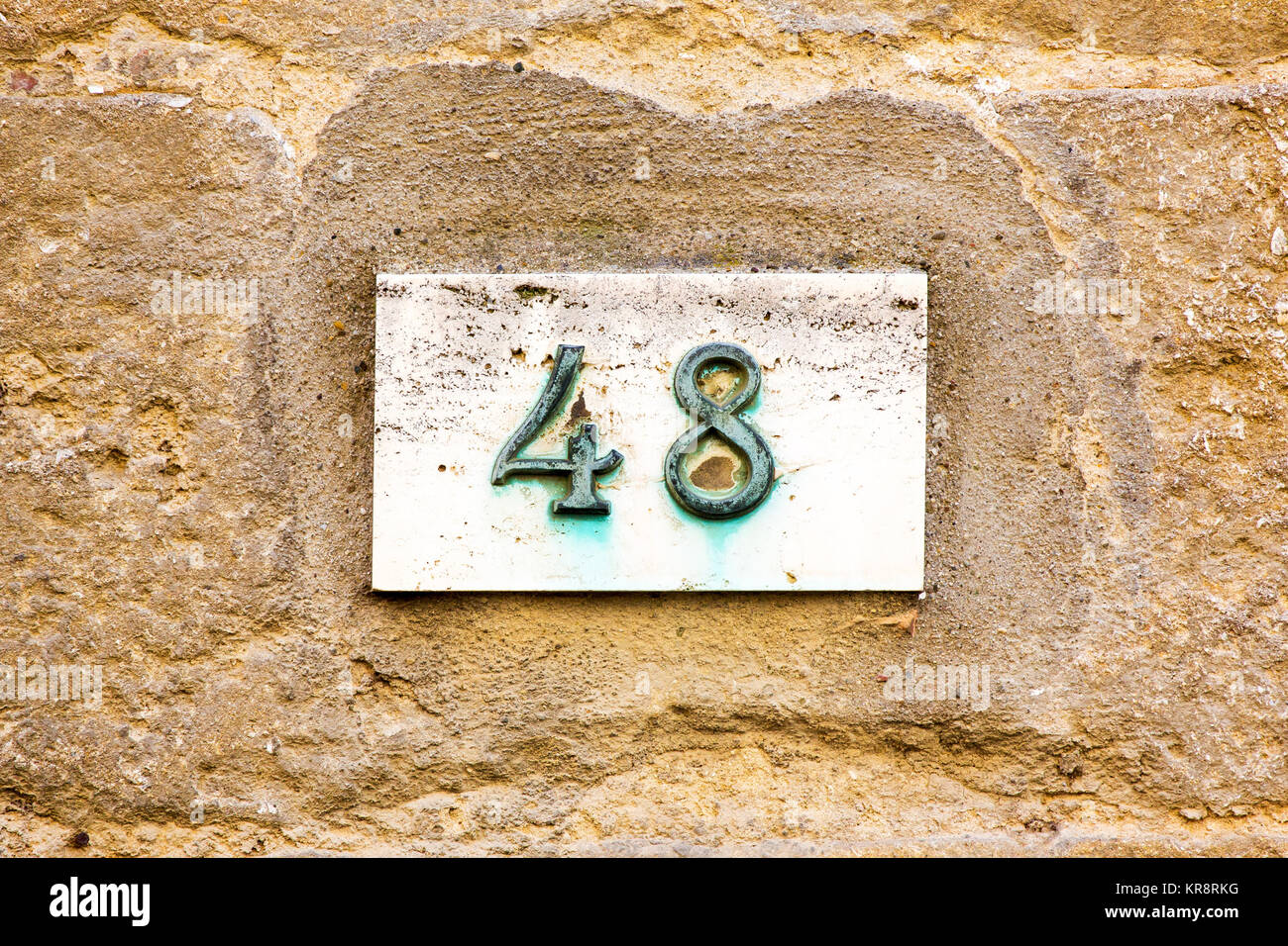 House number 48 on wall Stock Photo - Alamy