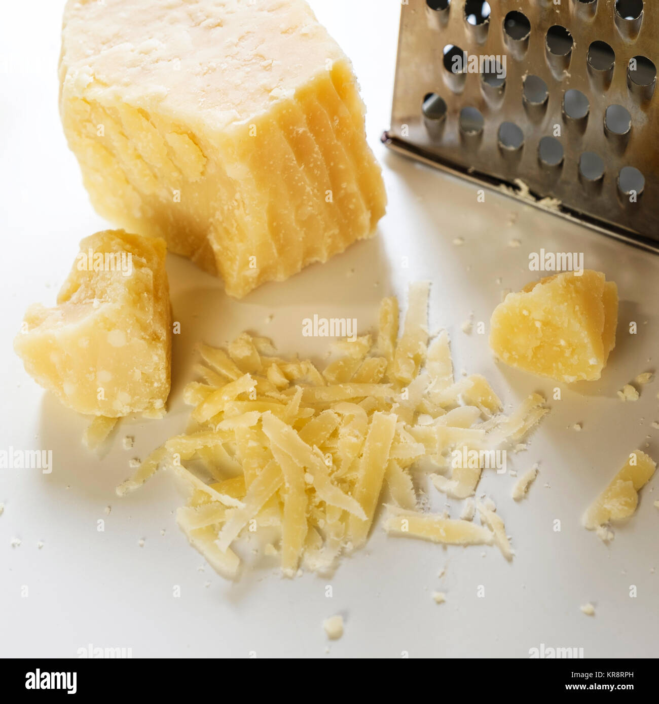 Parmesan cheese and grater Stock Photo - Alamy