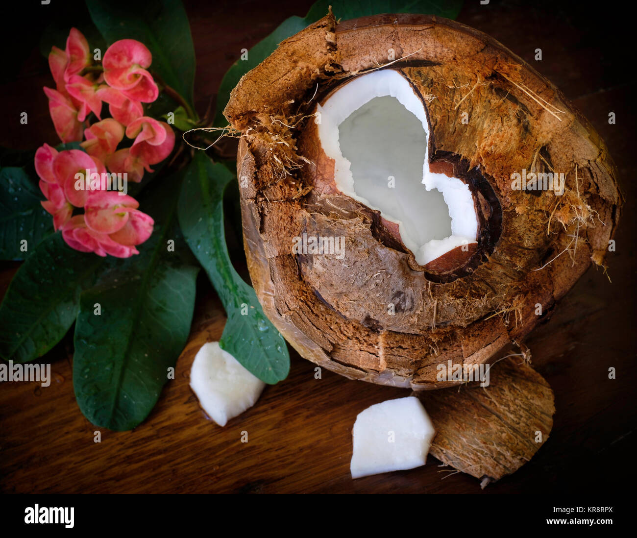 Organic coconut with water inside Stock Photo - Alamy