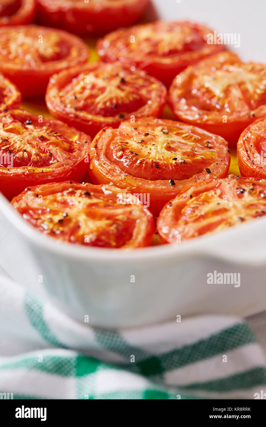Cooked tomatoes in olive oil Stock Photo - Alamy