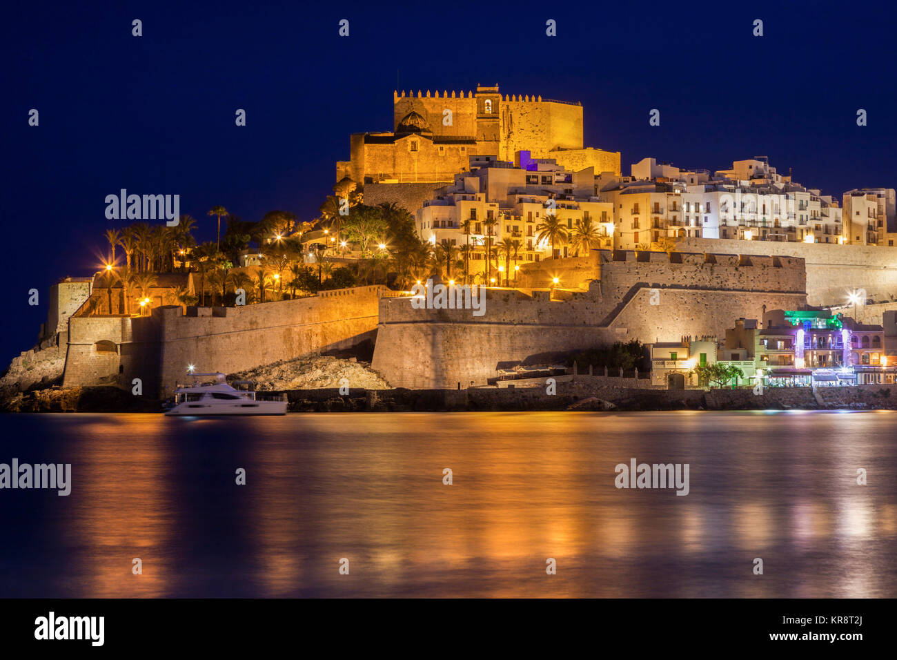 Spain, Valencian Community, Peniscola, Waterfront with fortified wall ...