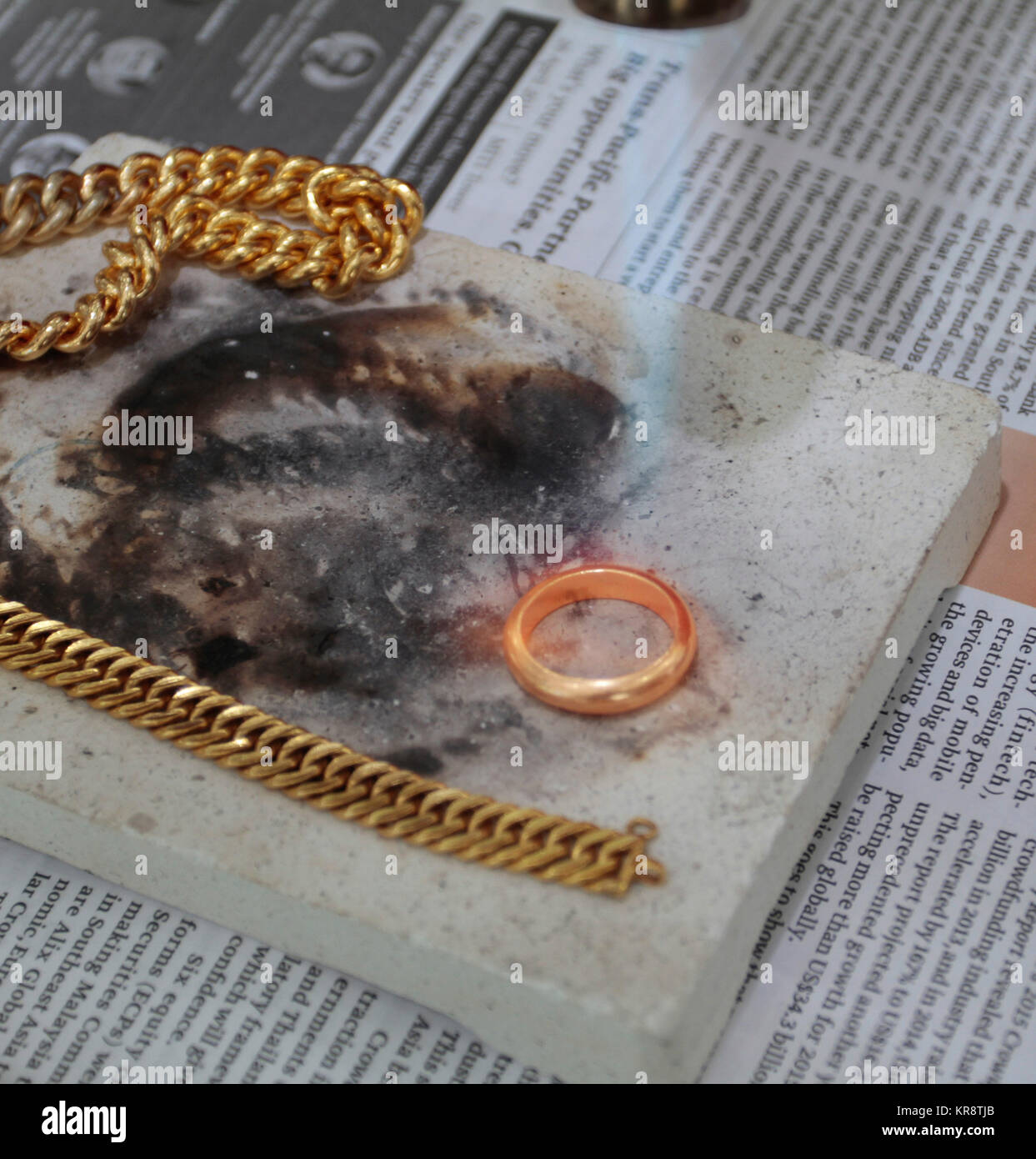 Heating up a gold ring to red hot Stock Photo - Alamy