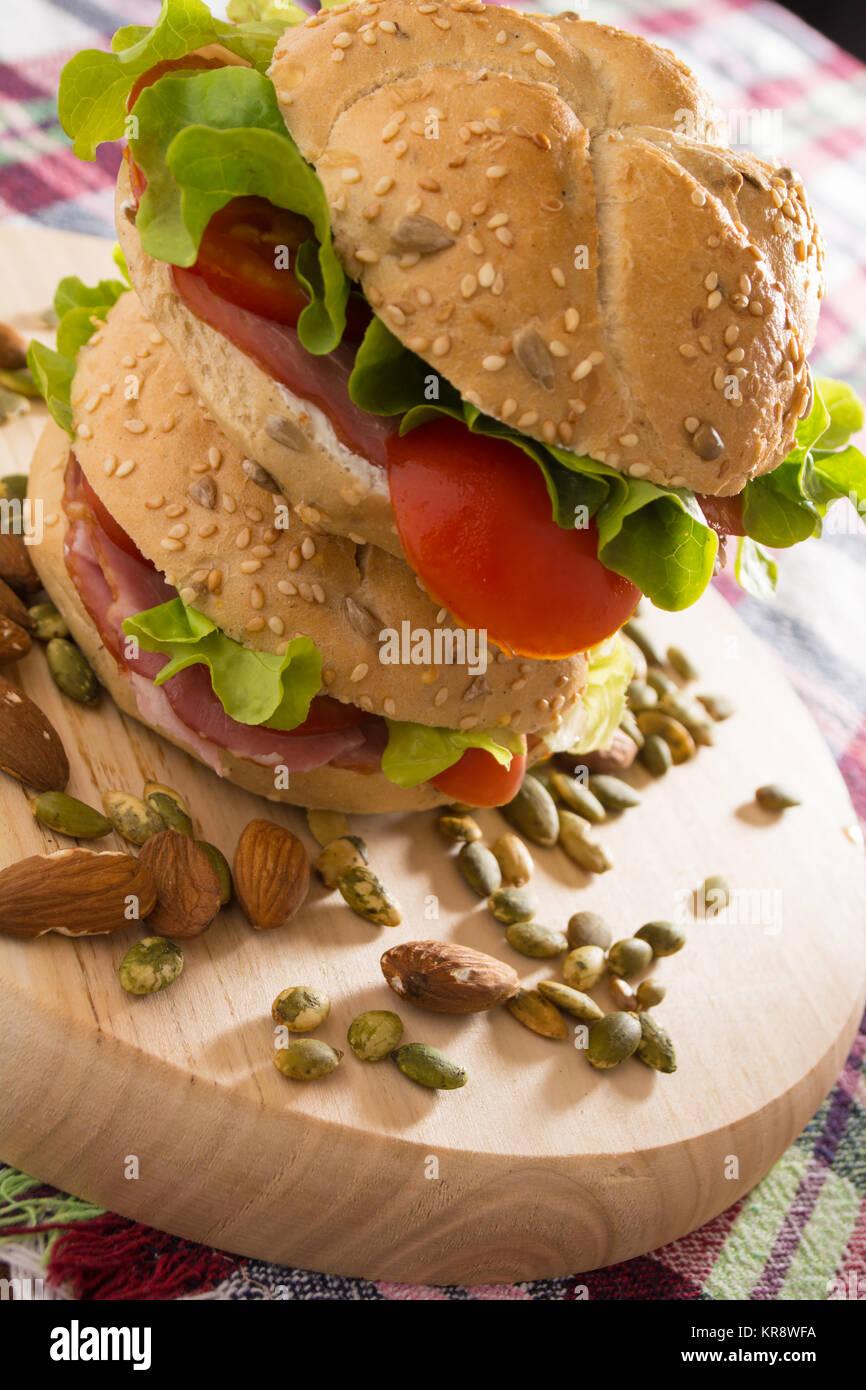 Stacked sandwiches with fresh smoked meat Stock Photo - Alamy