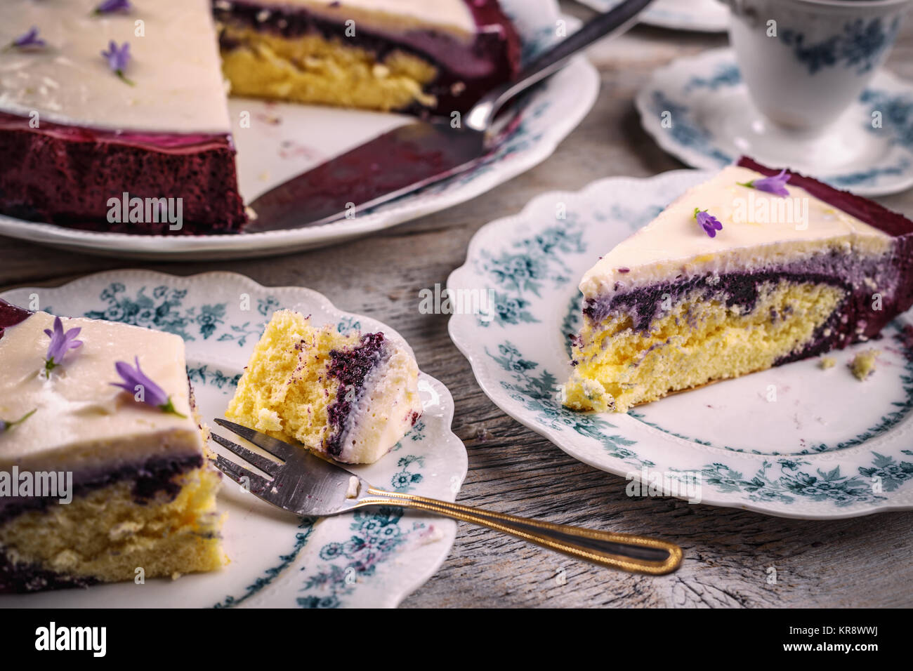 Slice of blueberry cake Stock Photo - Alamy