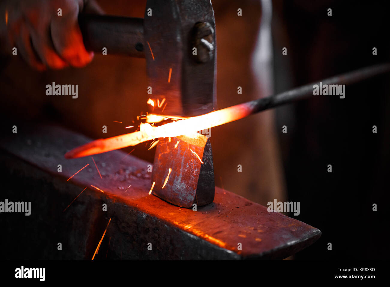 Blacksmith at work Stock Photo - Alamy