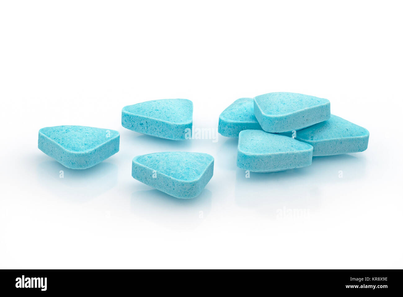 Light blue pills closeup macro photography Stock Photo - Alamy