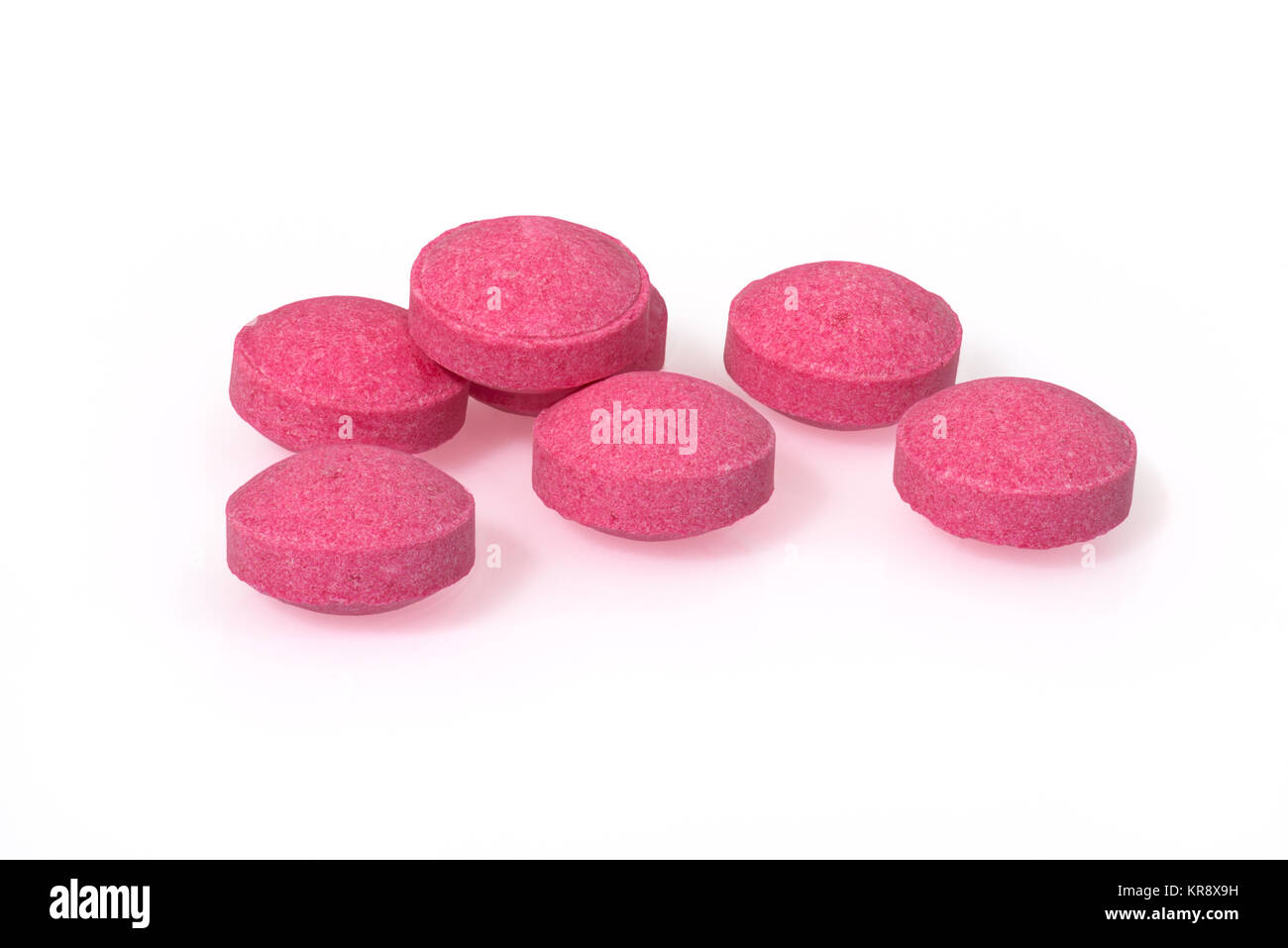 Pink pills closeup drug macro photography Stock Photo - Alamy