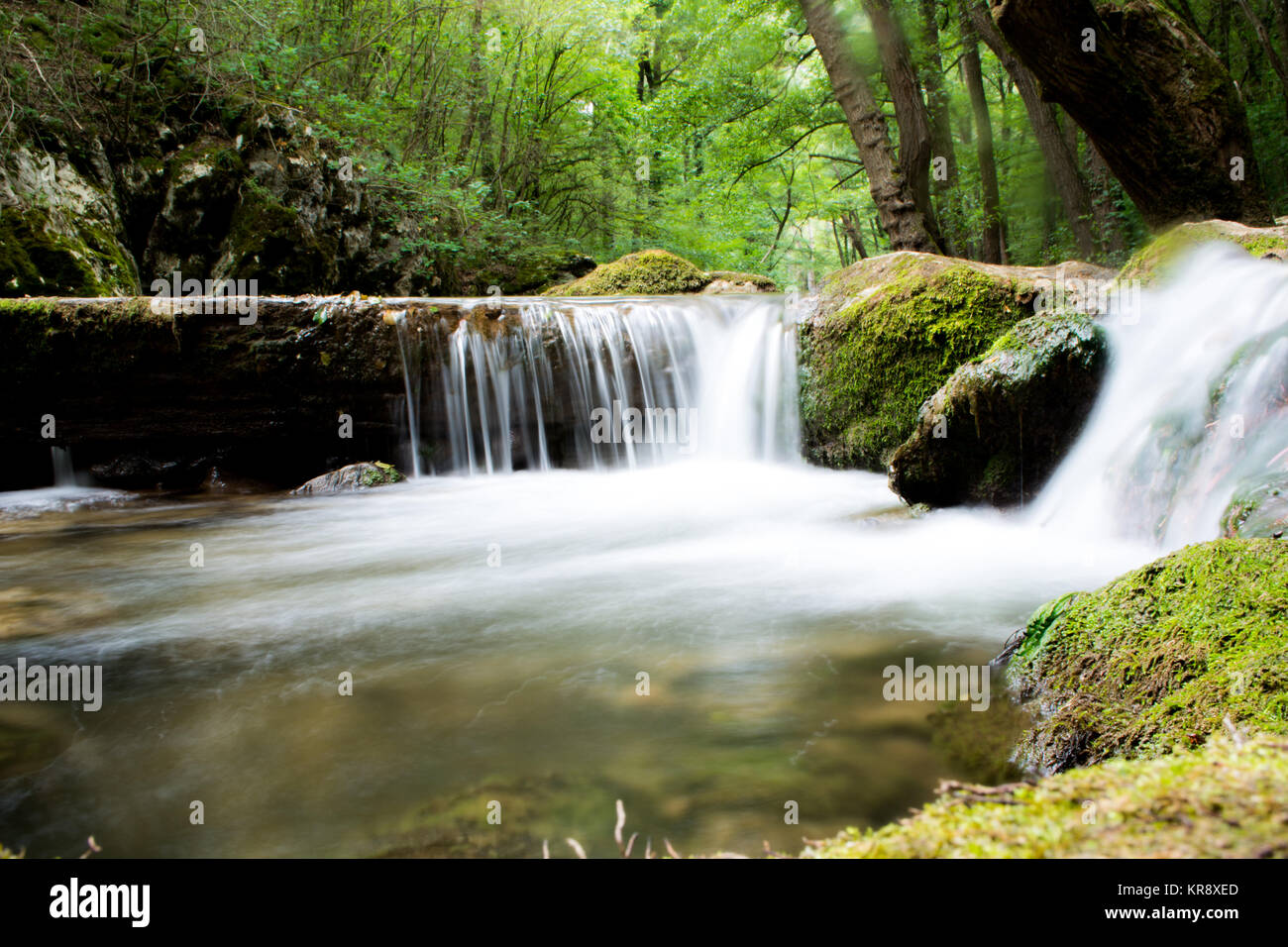 River water runs over rocks hi-res stock photography and images - Alamy