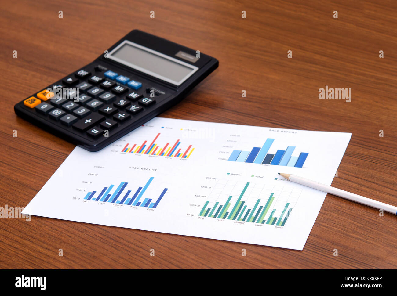 Documents graph on desk Stock Photo - Alamy