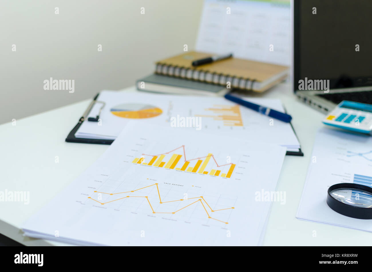 office desk graph Stock Photo - Alamy