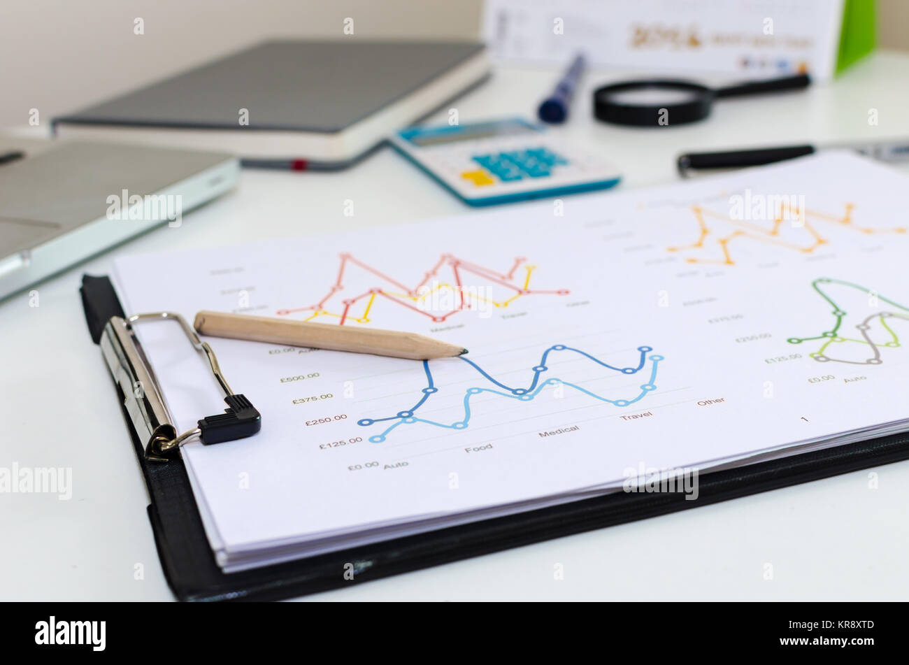 office desk graph Stock Photo - Alamy