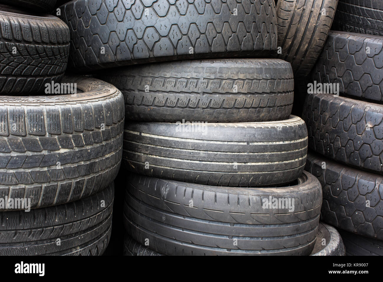 Stacks of used tyres Stock Photo - Alamy