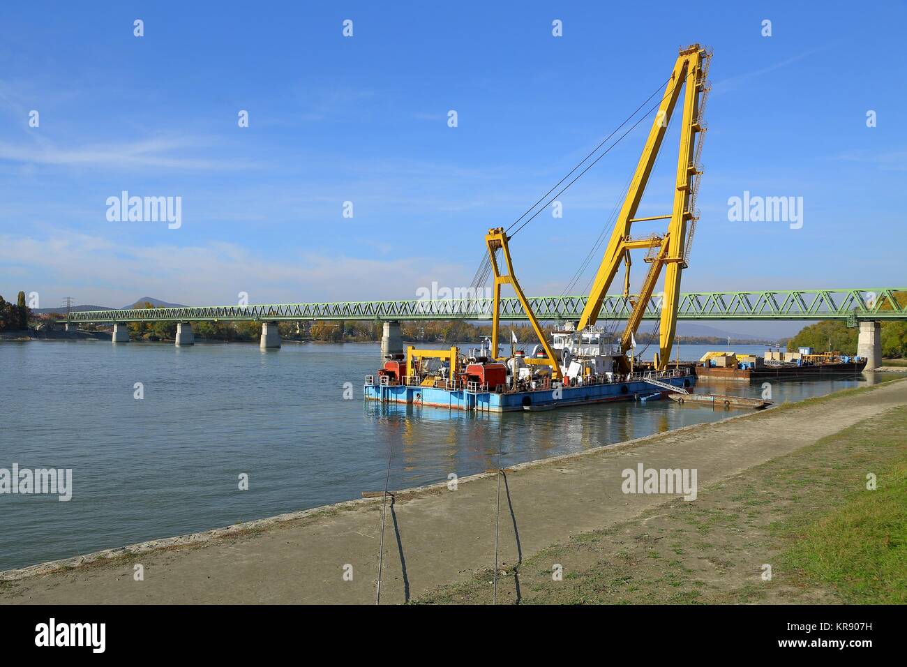 Barges with construction equipment Stock Photo - Alamy