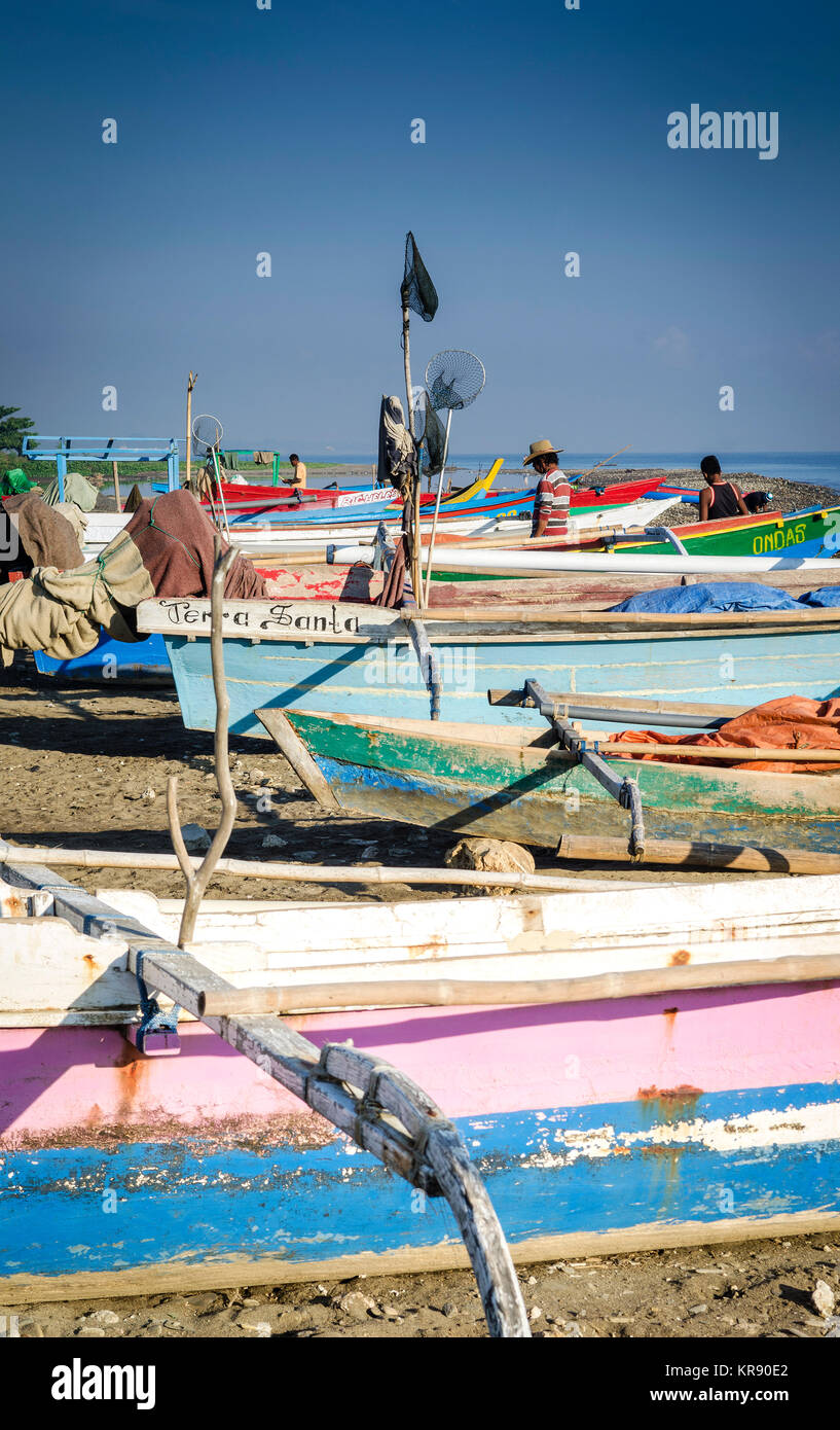 coast with traditional fishing boats on dili beach in east timor leste ...