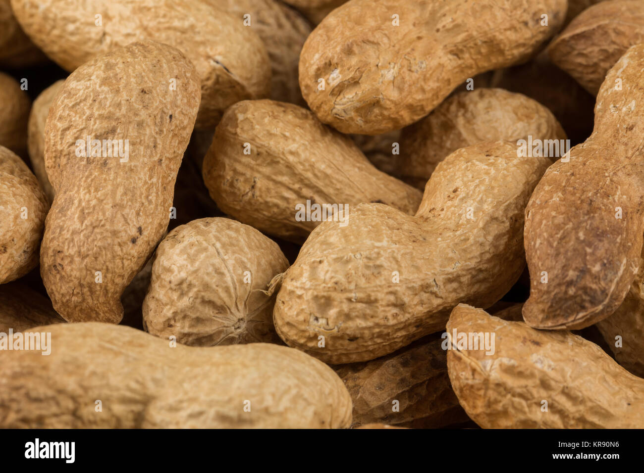 Pile of peanuts shells close up Stock Photo - Alamy