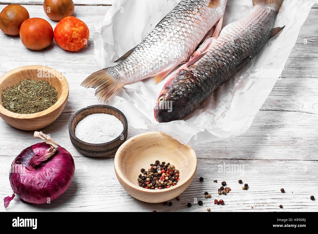 Freshly caught fish and spices cooking cooking Stock Photo - Alamy