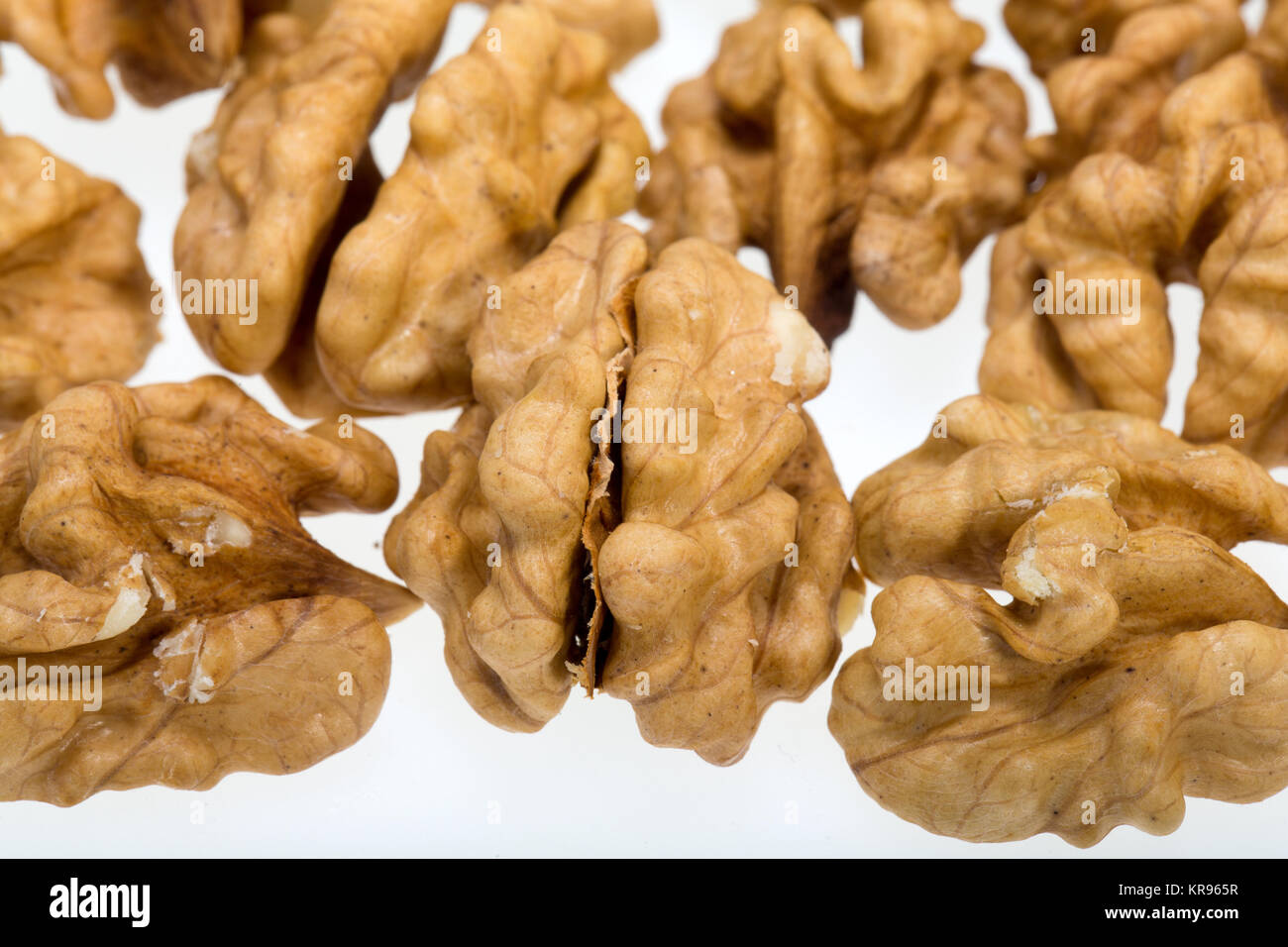 cracked walnut isolated on the white background Stock Photo - Alamy