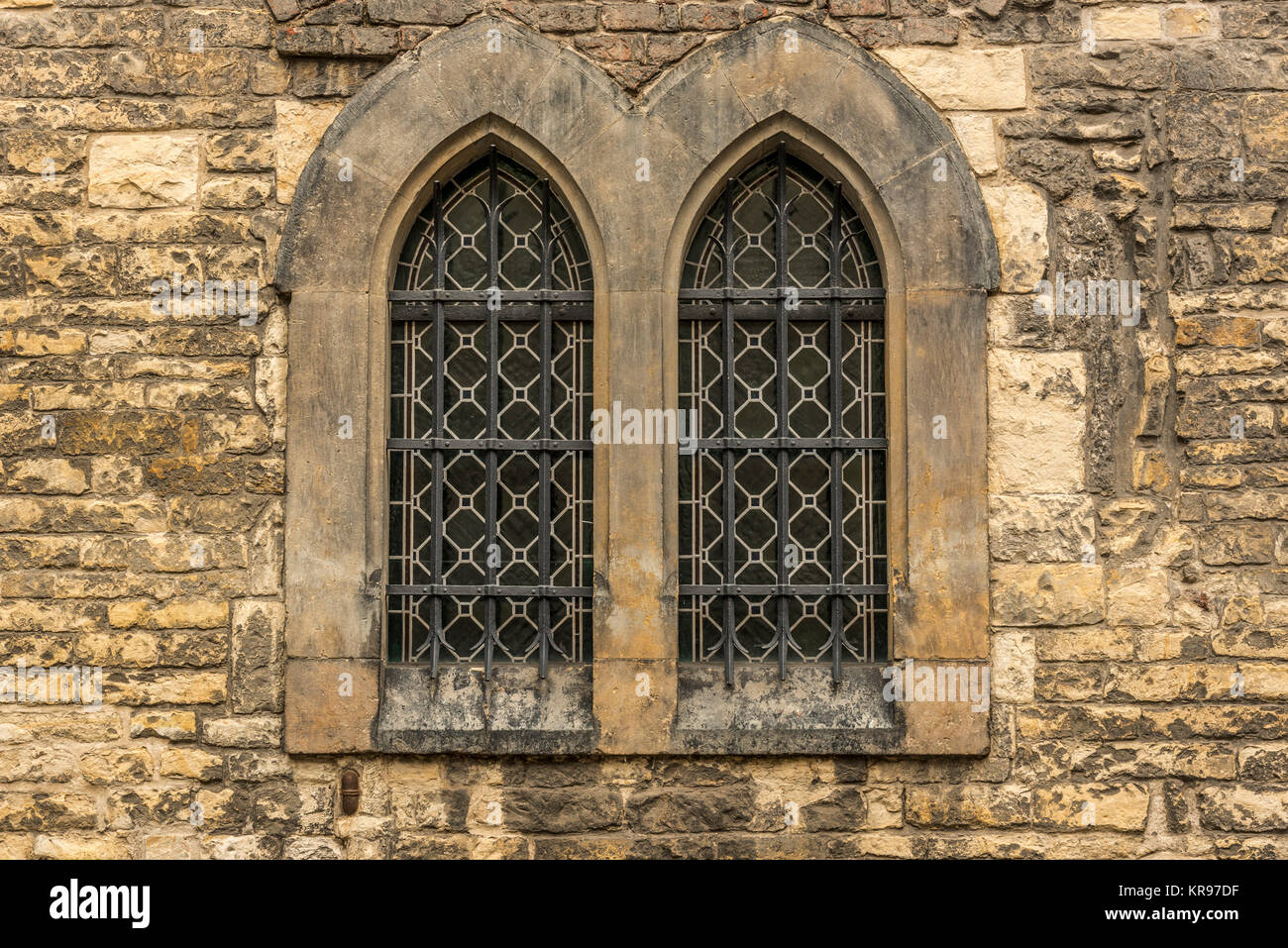 Church windows with bars Stock Photo - Alamy