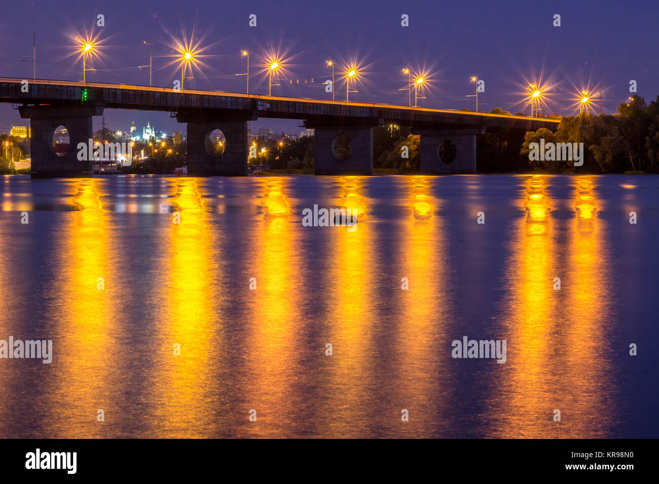 Night bridge lights reflected in river water. HDR Stock Photo - Alamy
