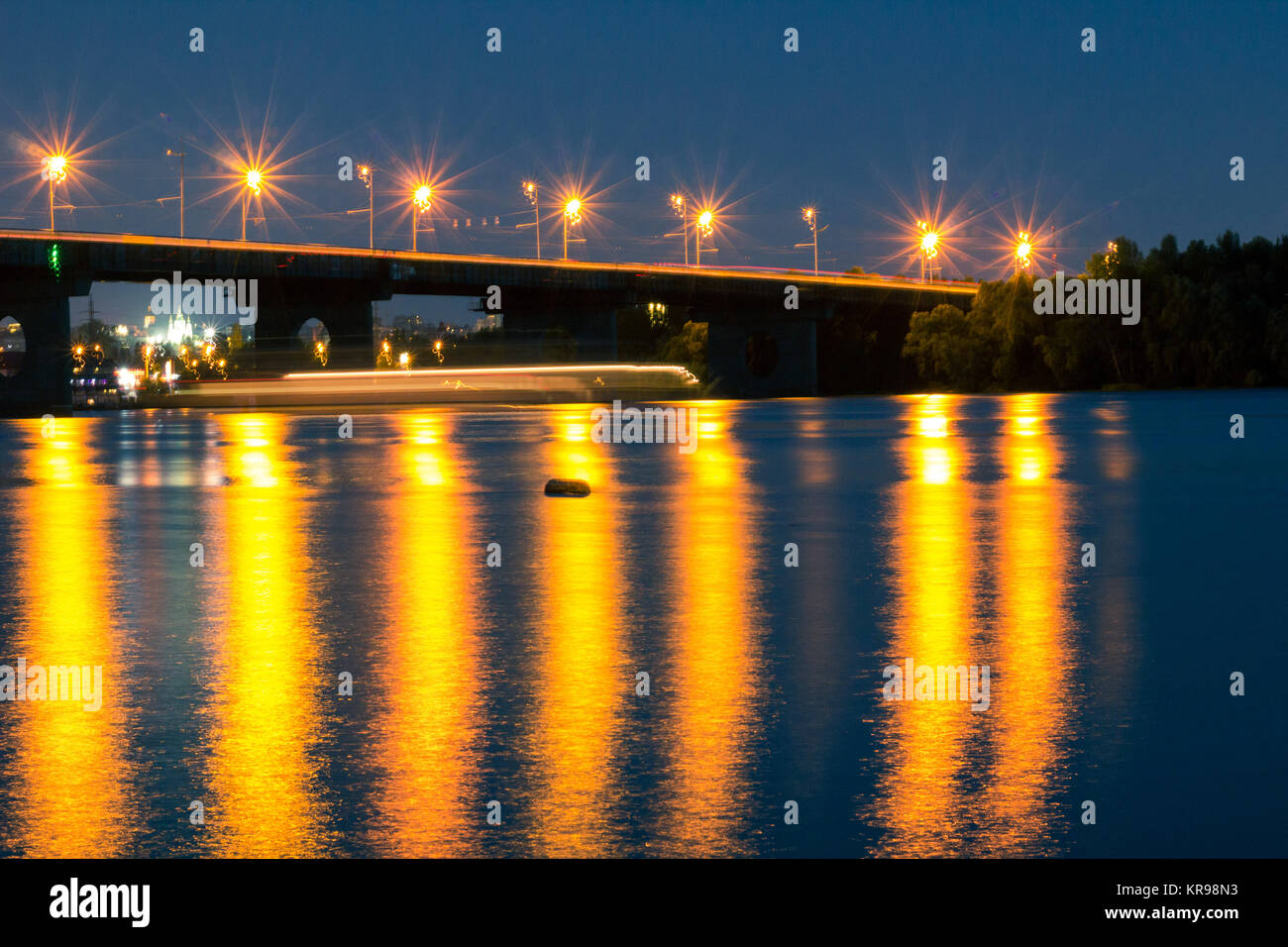 Night bridge lights reflected in river water Stock Photo - Alamy