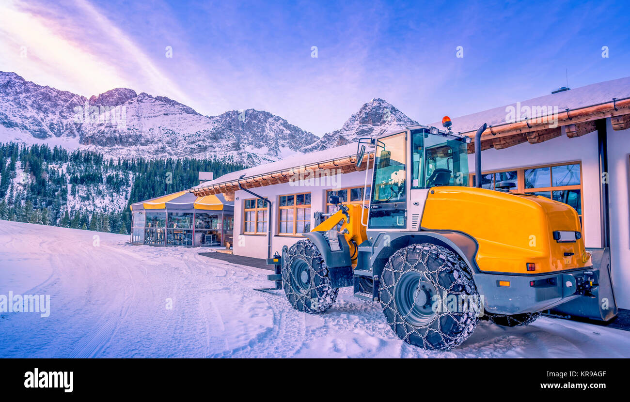 Wheel loader winter adapted Stock Photo - Alamy