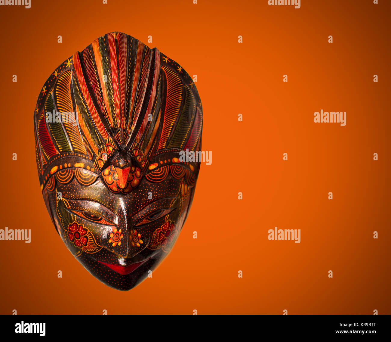 Traditional Indonesian mask in Bali stile on red background Stock Photo ...