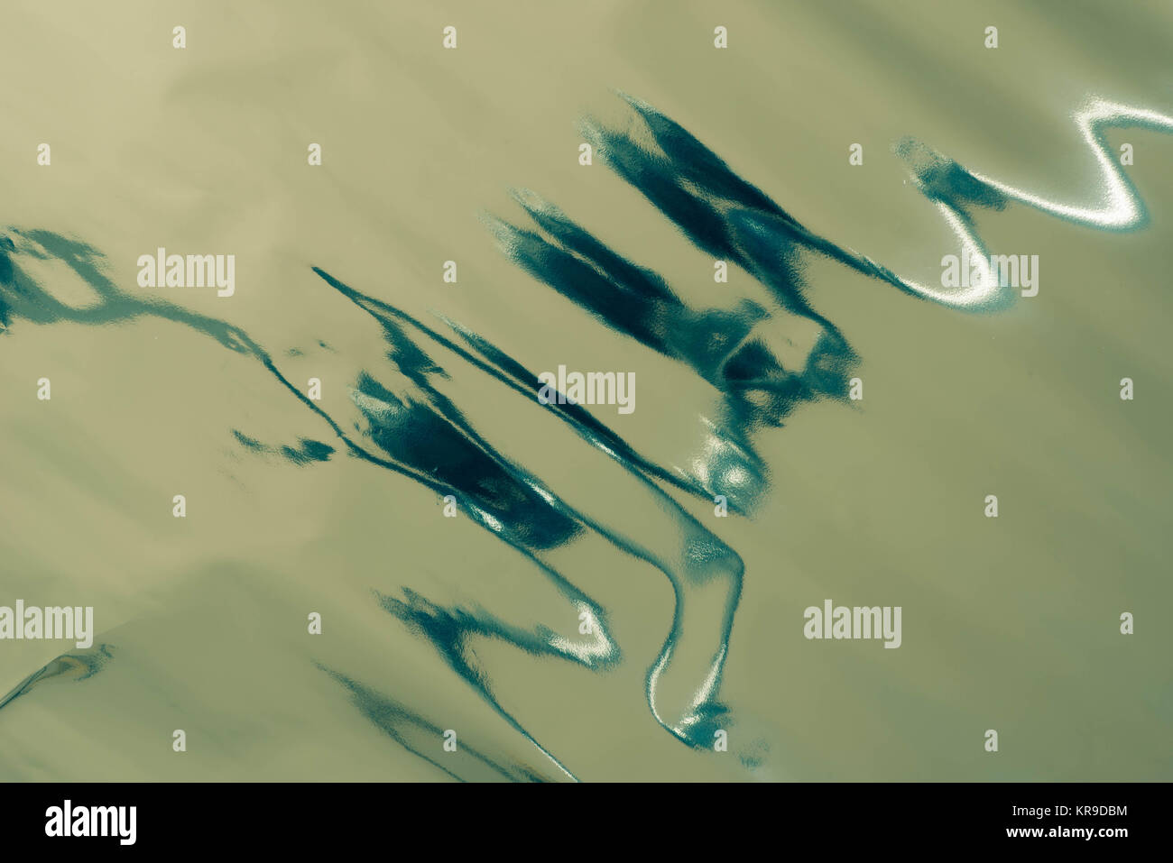 silver color folded metallic foil abstract bacgkground Stock Photo - Alamy