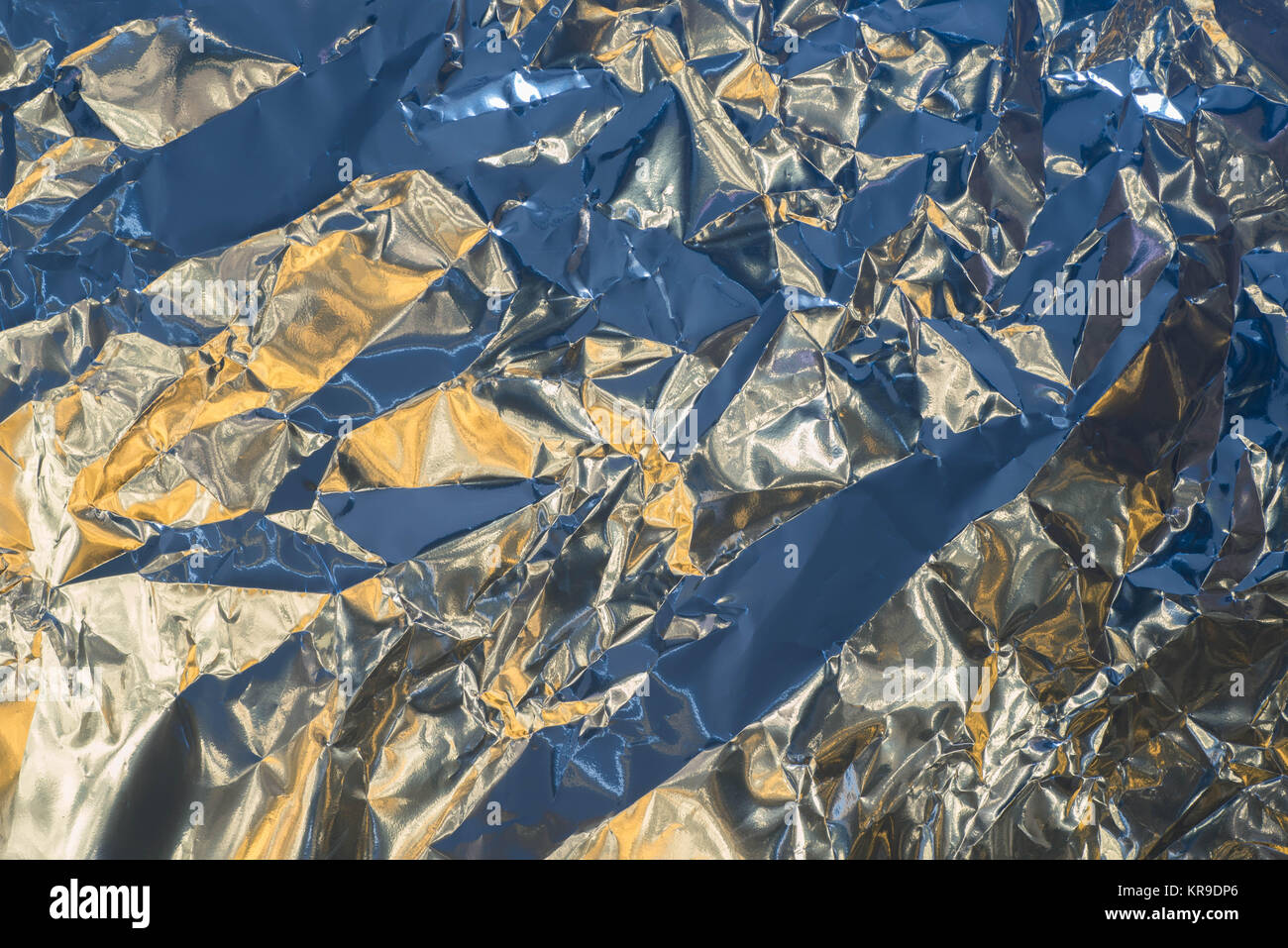 Blue creased shiny foil hi-res stock photography and images - Alamy