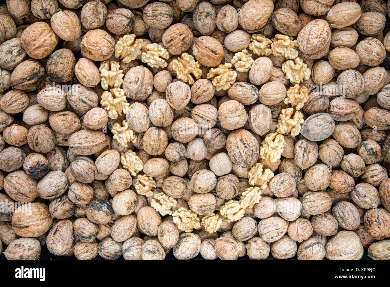 Walnuts and nut kernels Stock Photo - Alamy