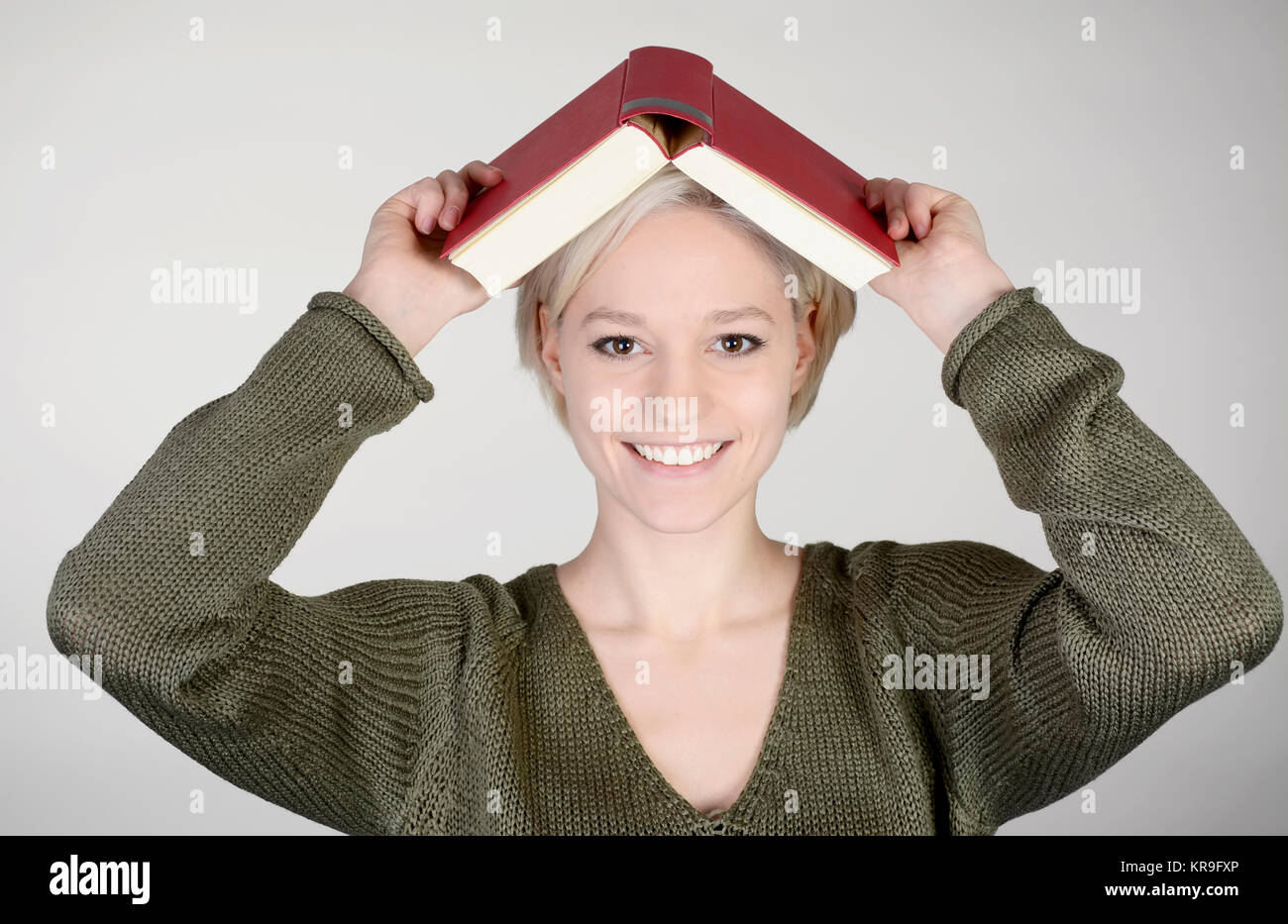 woman with book Stock Photo - Alamy