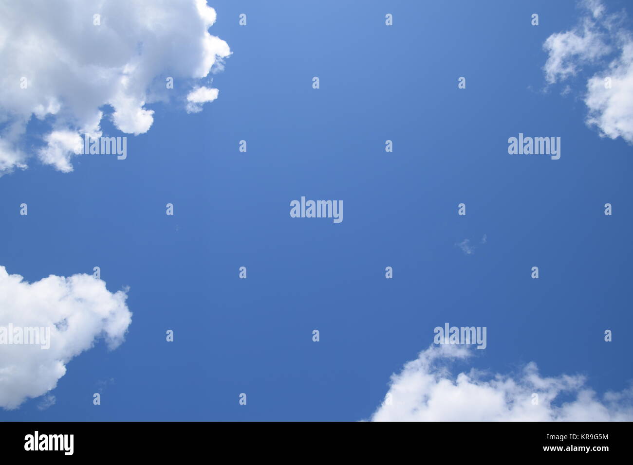 Bright midday blue sky with clouds Stock Photo - Alamy