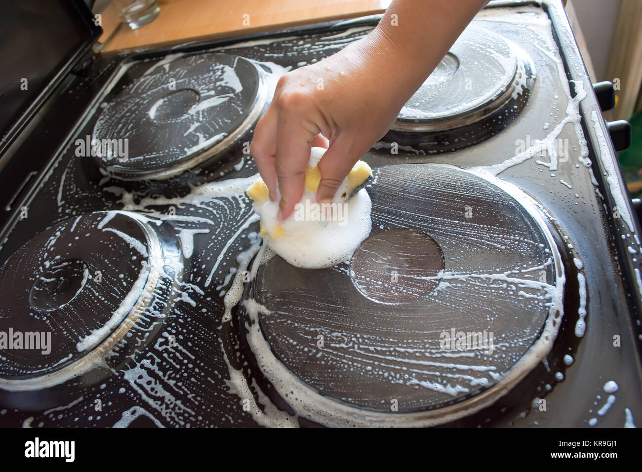 Kitchen cleaning time Stock Photo - Alamy