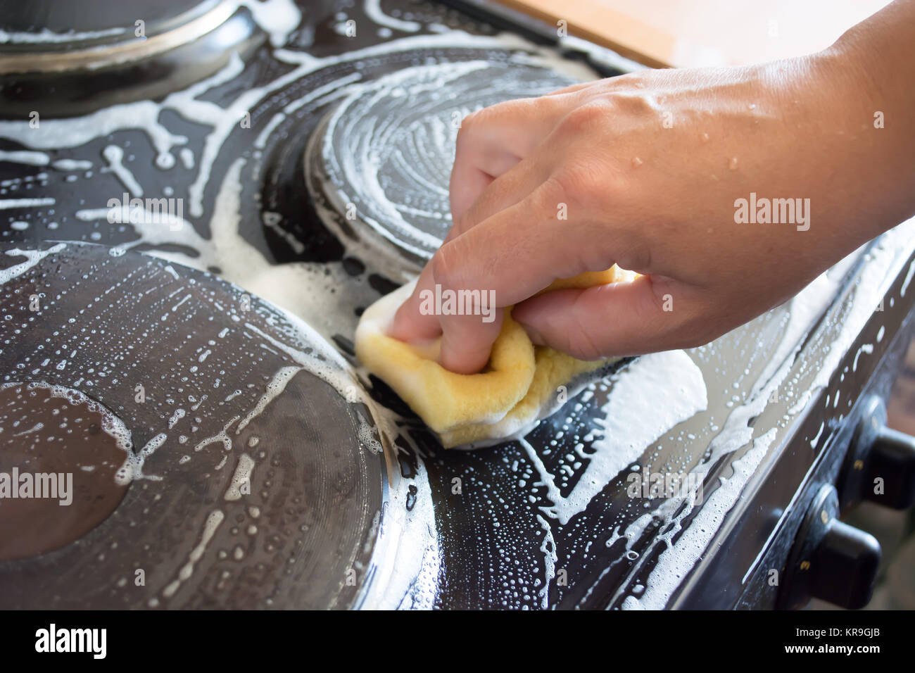 Kitchen cleaning time Stock Photo - Alamy
