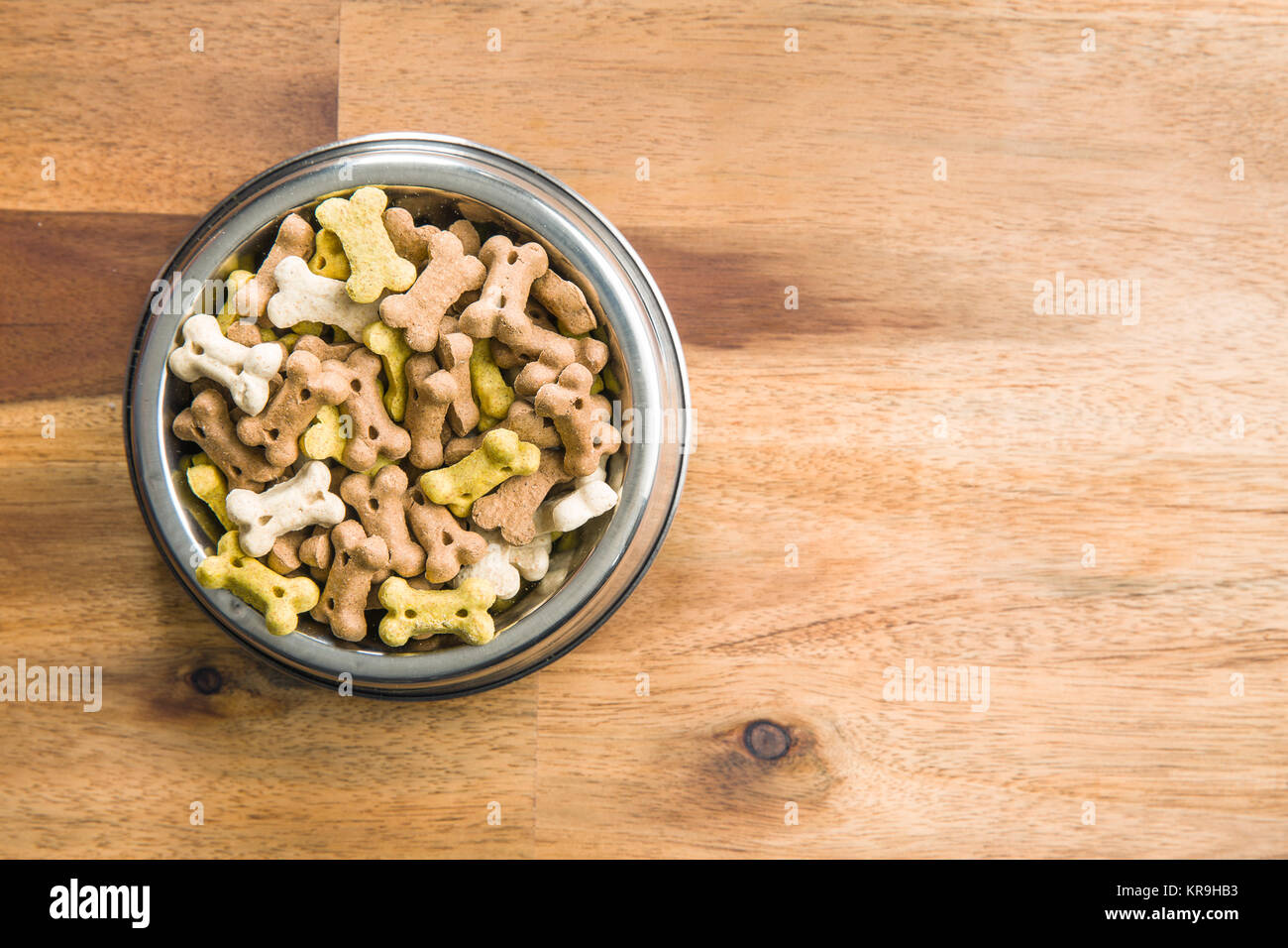 Dog food shaped like bones Stock Photo - Alamy