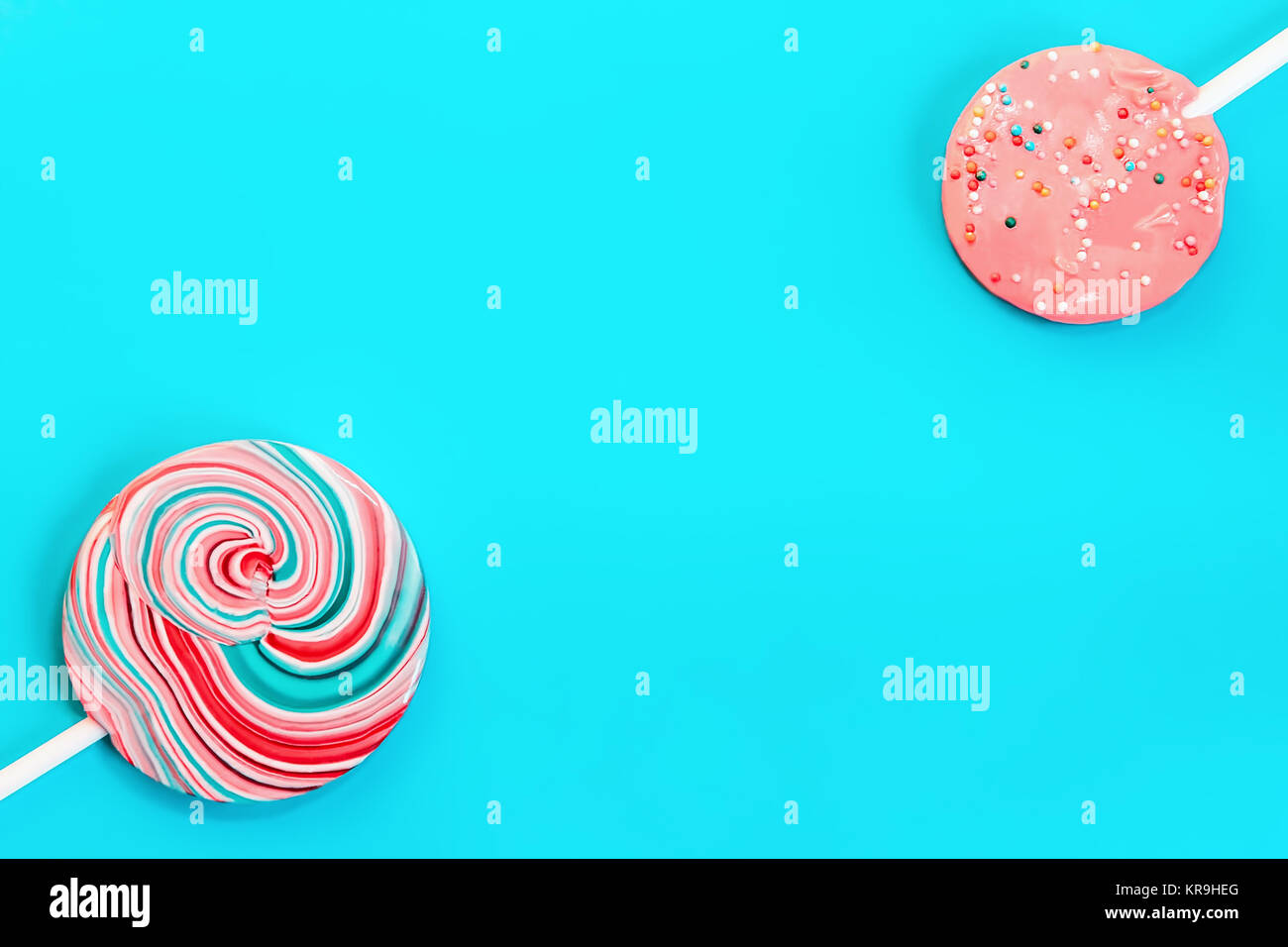 Vintage Blue Background With Two Candy Stock Photo - Alamy