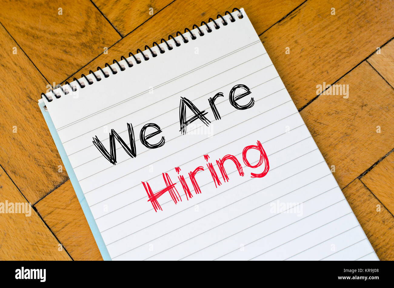 We are hiring text concept on notebook Stock Photo - Alamy