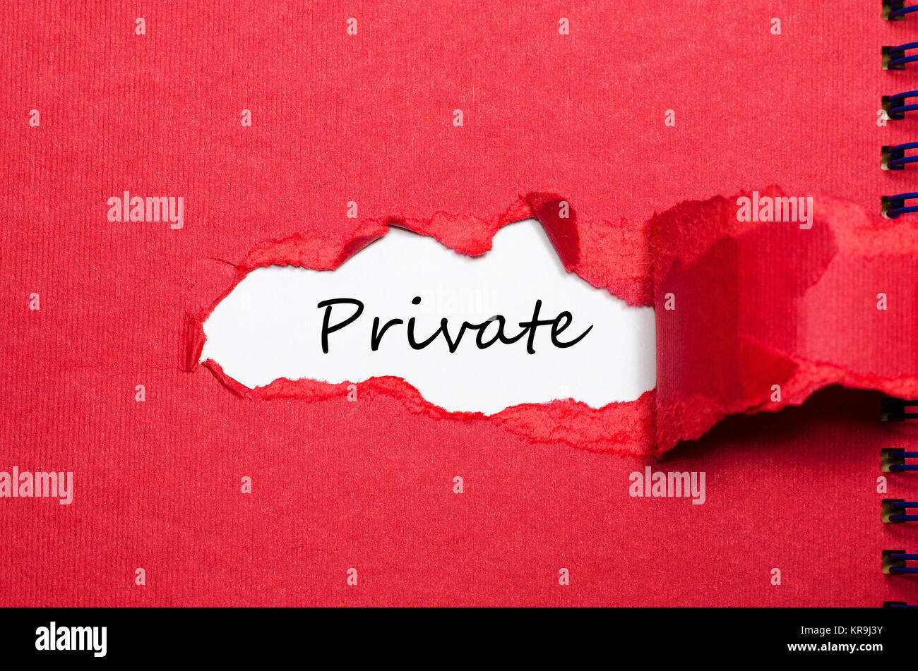 The word private appearing behind torn paper Stock Photo - Alamy