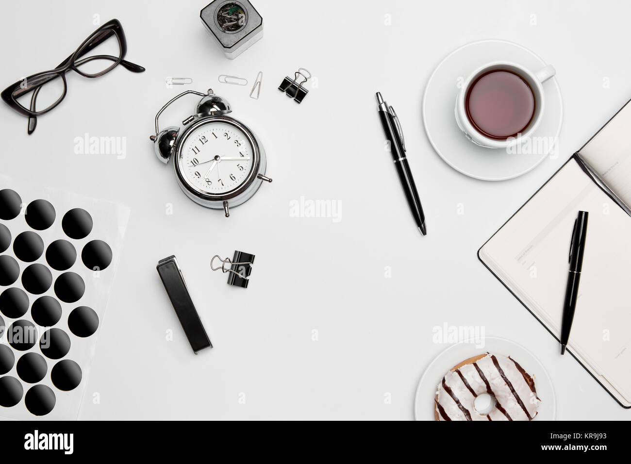 The clock, pen, and glasses on white background Stock Photo - Alamy
