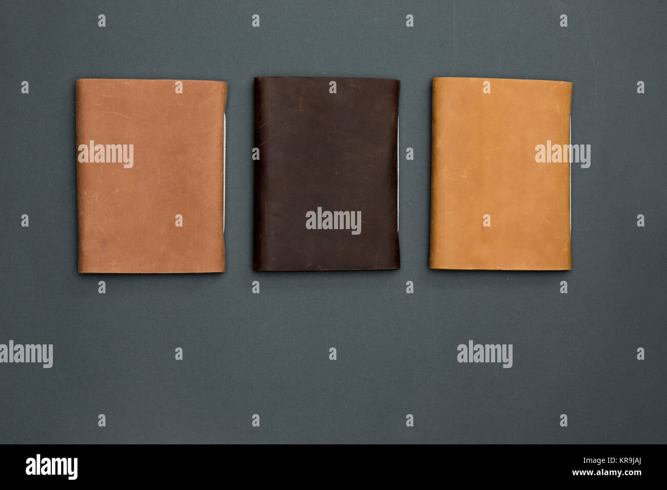 Office desk table with notebooks Stock Photo - Alamy