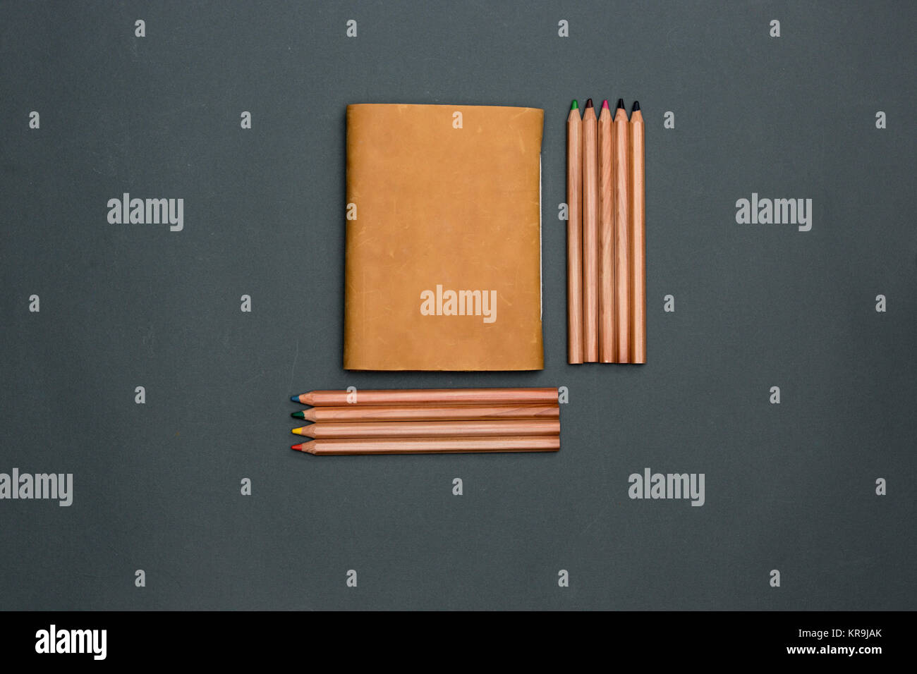 Office desk table with pencils, notebook Stock Photo - Alamy