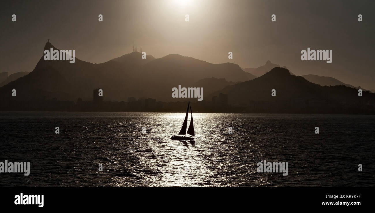 Sailing boat backlit in Rio de Janeiro Stock Photo - Alamy
