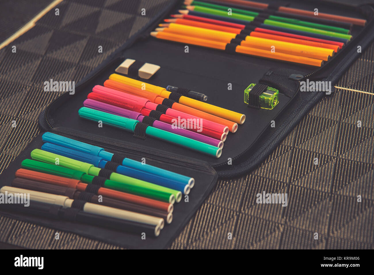 Close up on pencil case on table background Stock Photo - Alamy