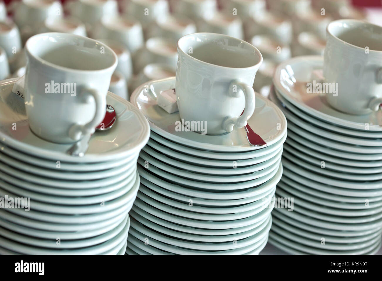 Coffee cups an plates in a restaurant Stock Photo - Alamy
