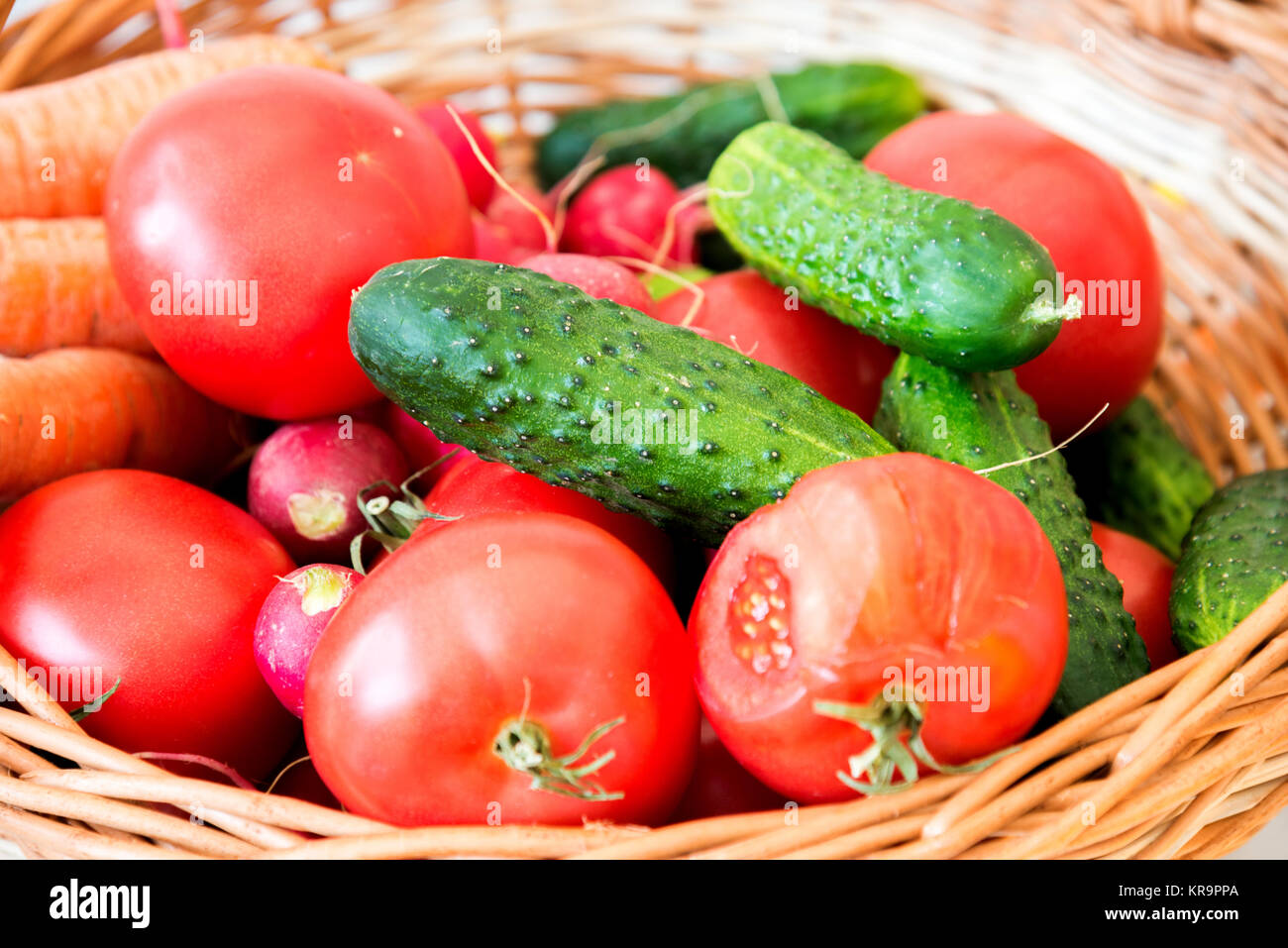 Mix of vegetables in basket Stock Photo - Alamy