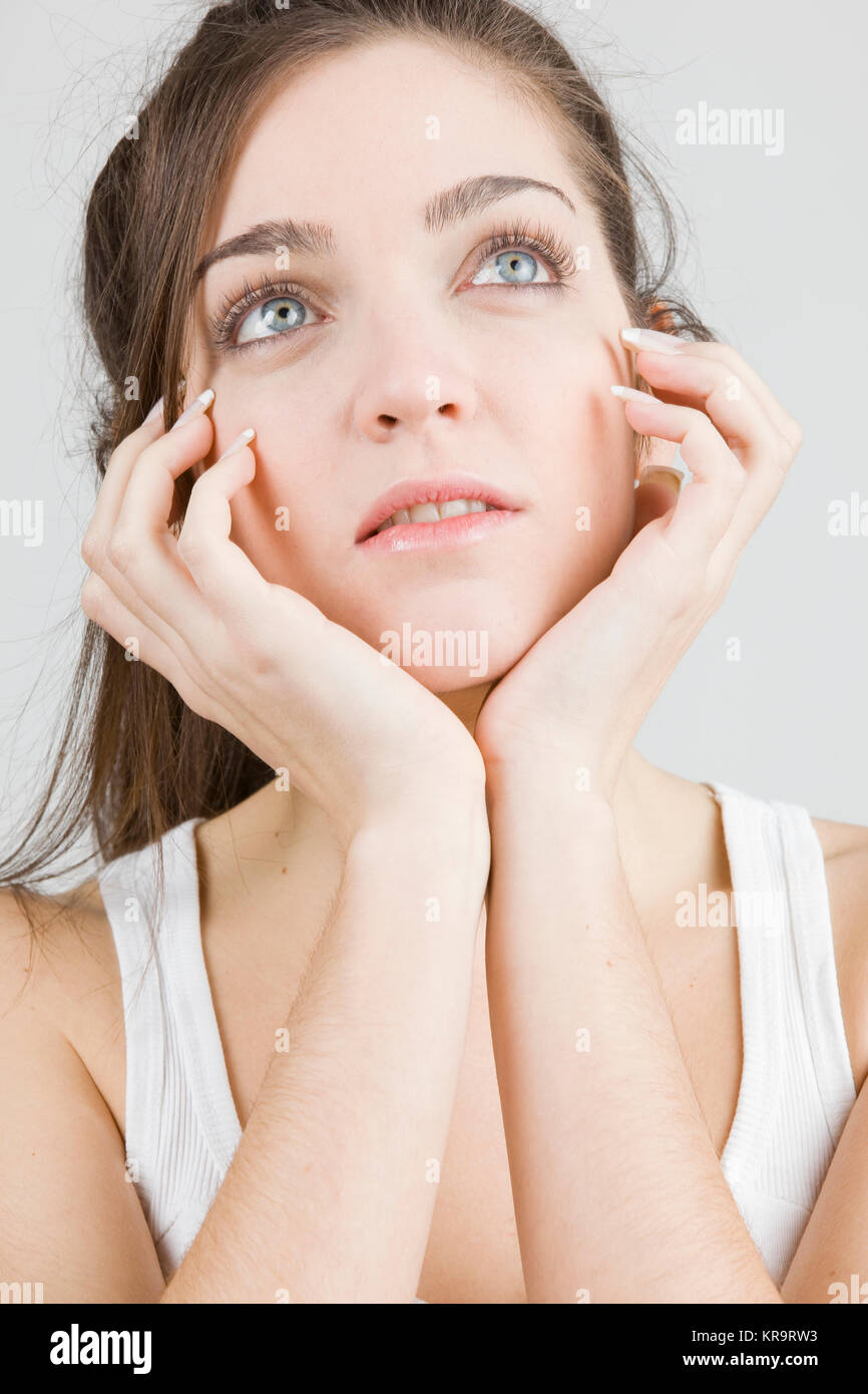stylish young woman posing in clear background Stock Photo - Alamy