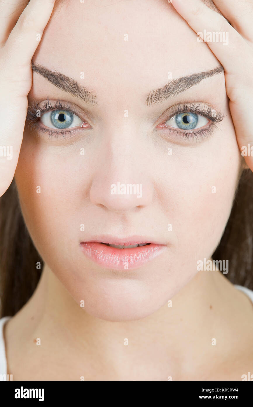 stylish young woman posing in clear background Stock Photo - Alamy